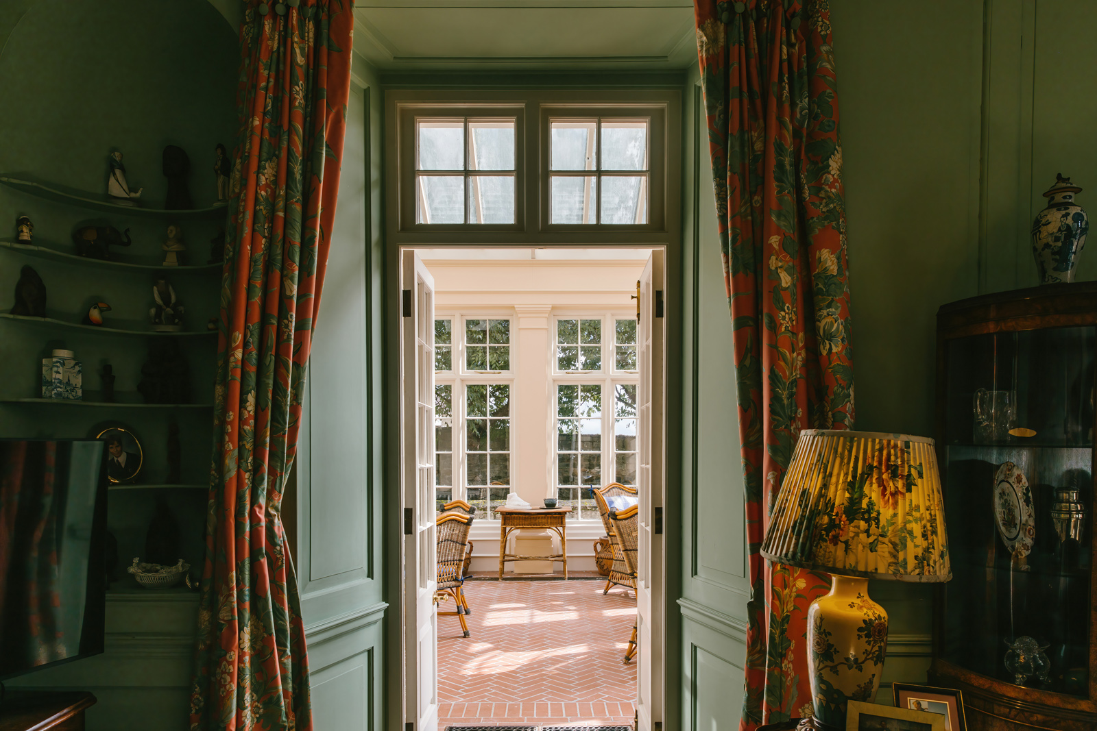 Outside, the estate boasts landscaped gardens, a lake, and paddocks ...